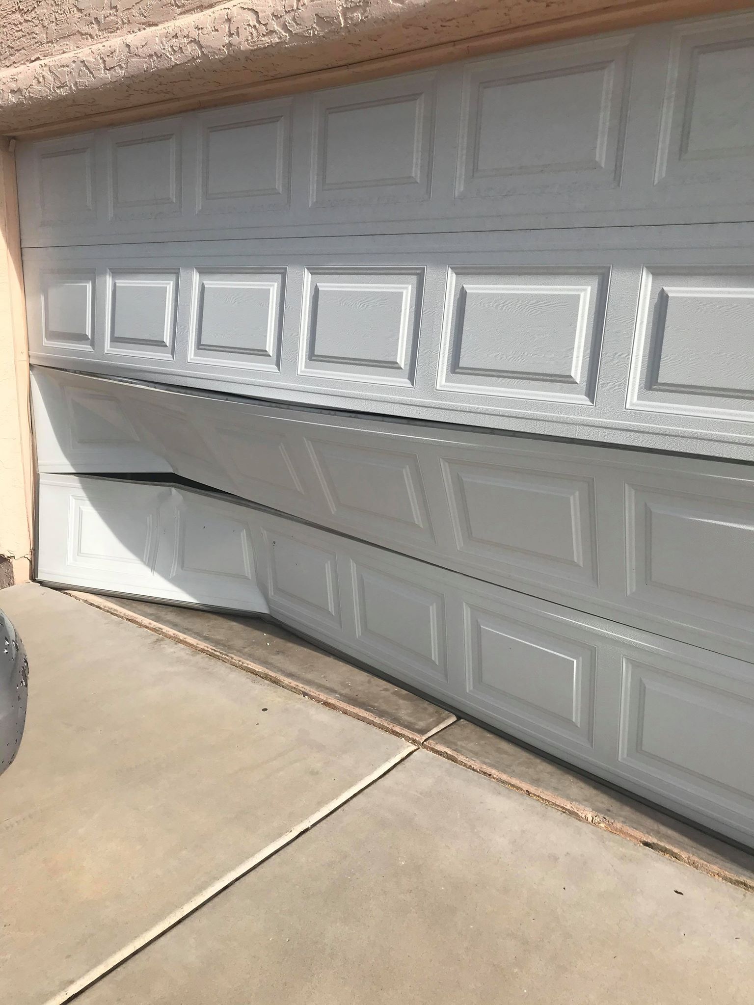 replace bottom two panels - Garage Door Az